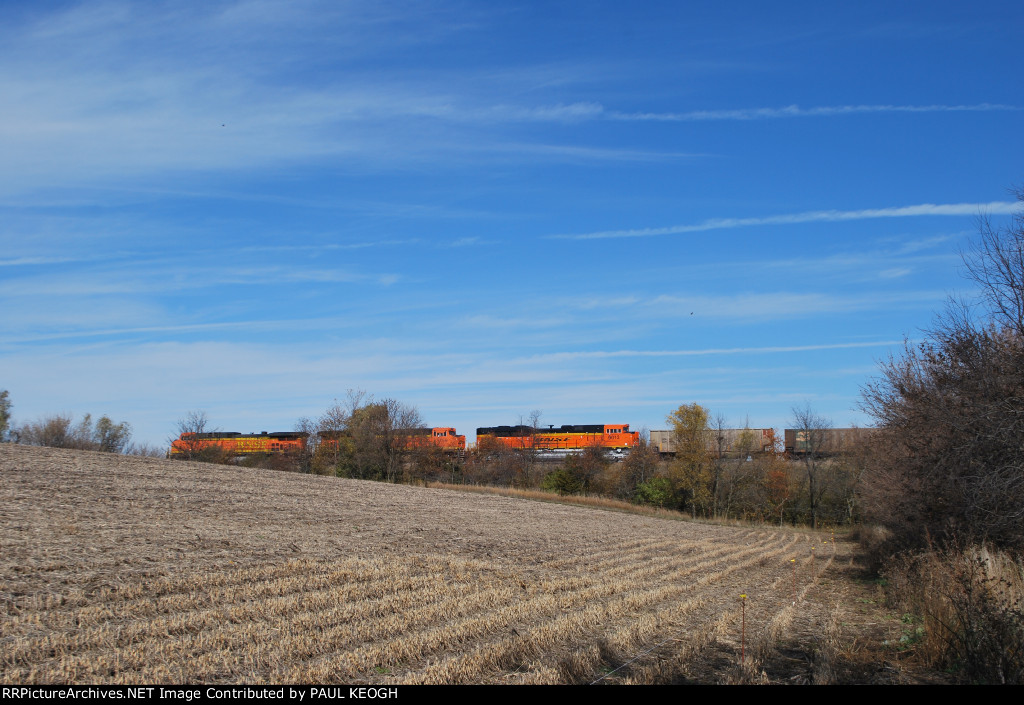 BNSF 9013 from a Distance as she waits to pull west with a Empty Coal train as a #3 unit.